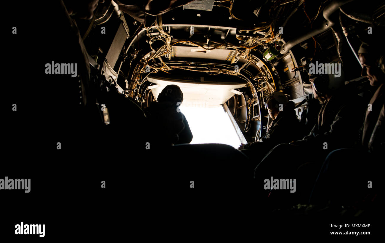 PACIFIC OCEAN -- A U.S. Marine crew chief prepares to offload an MV-22B ...