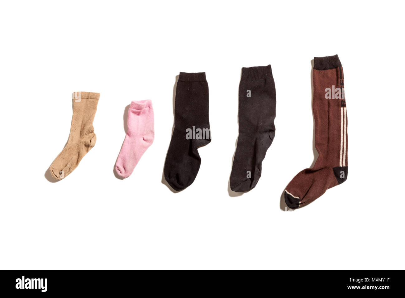 old socks, isolated on white background Stock Photo - Alamy