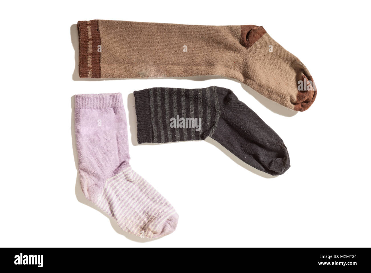 old socks, isolated on white background Stock Photo - Alamy