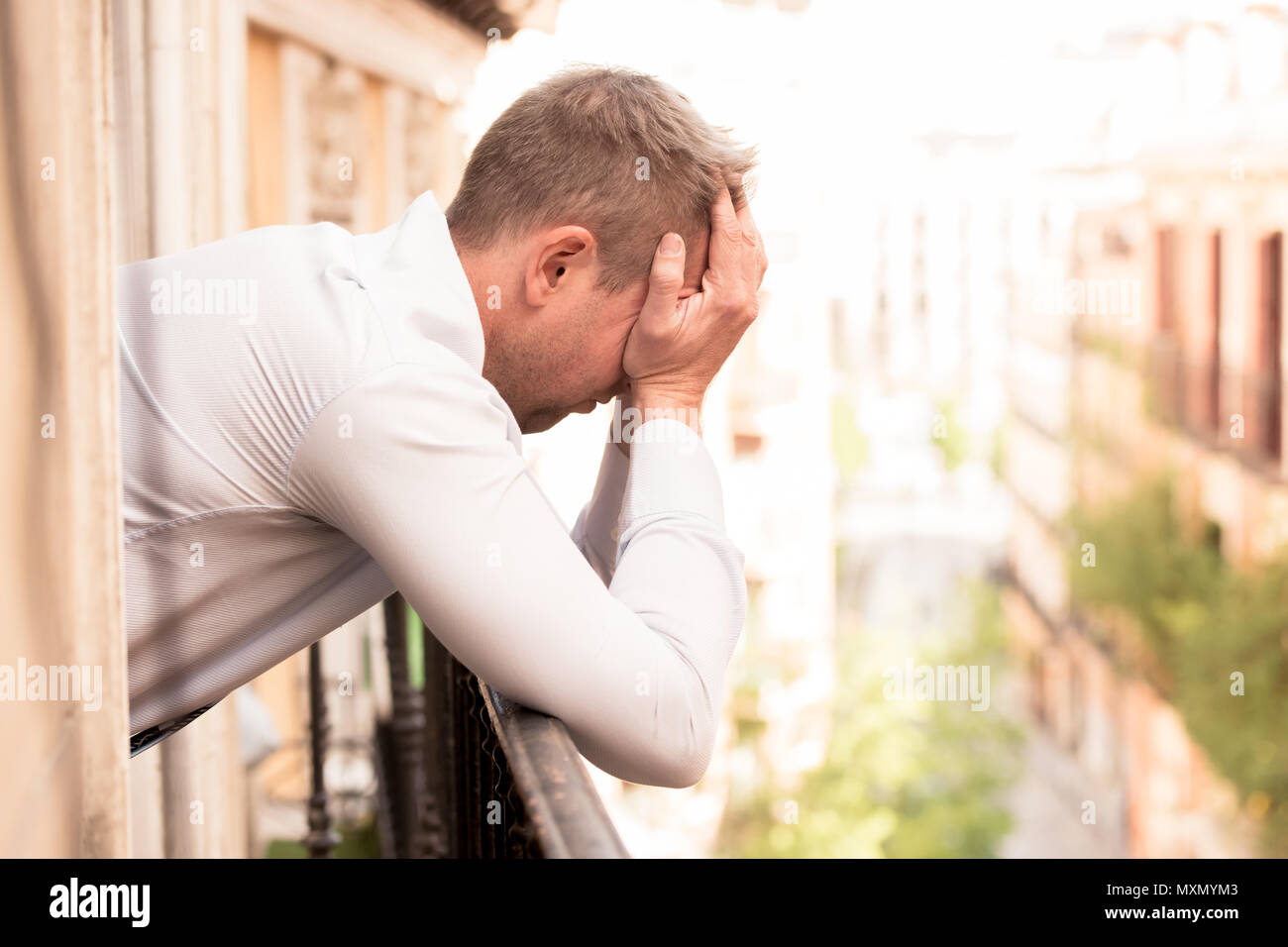 Man Balcony And Sad Stock Photos & Man Balcony And Sad Stock Images - Alamy