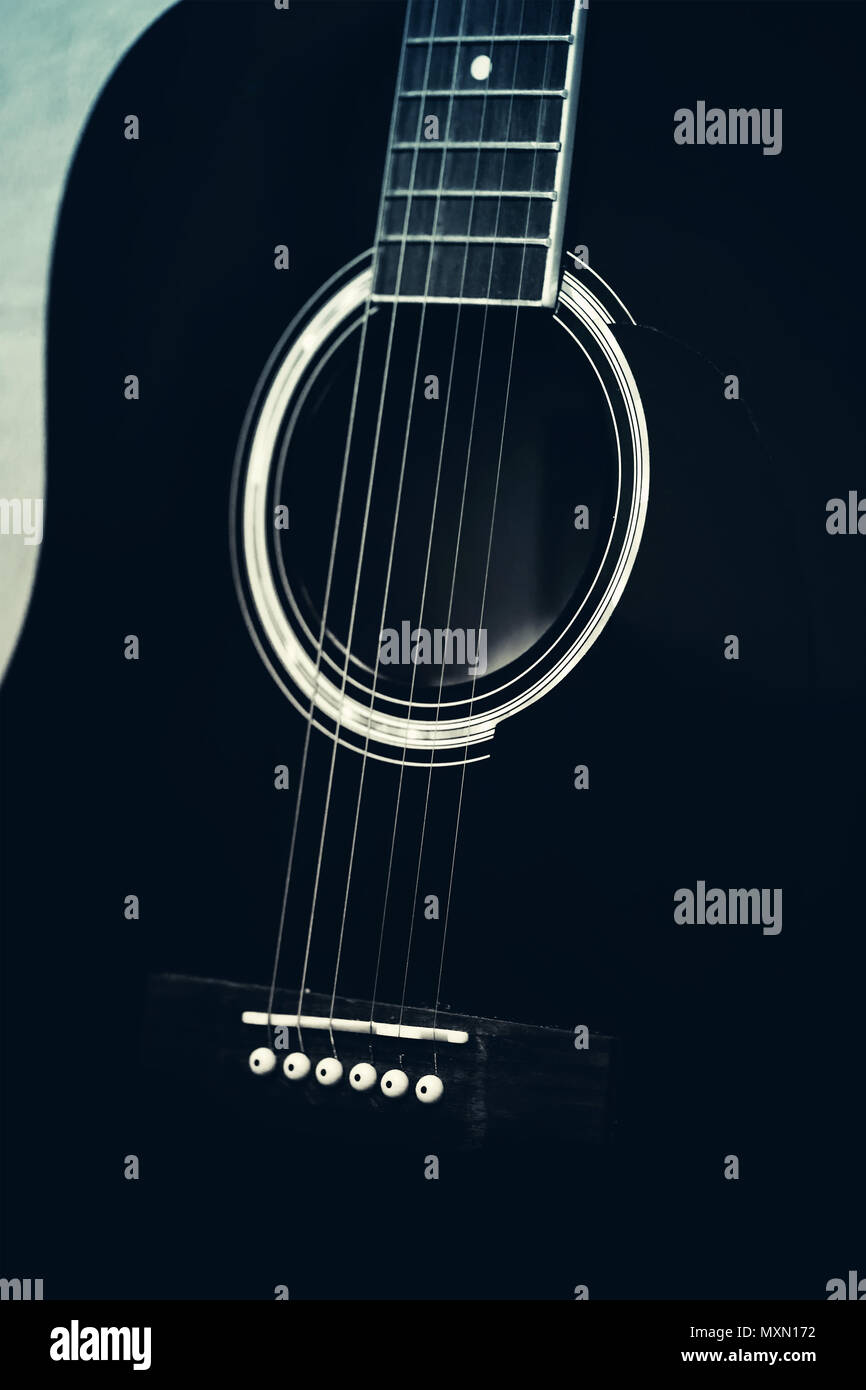 Black guitar music instrument close up photo in vintage style Stock ...