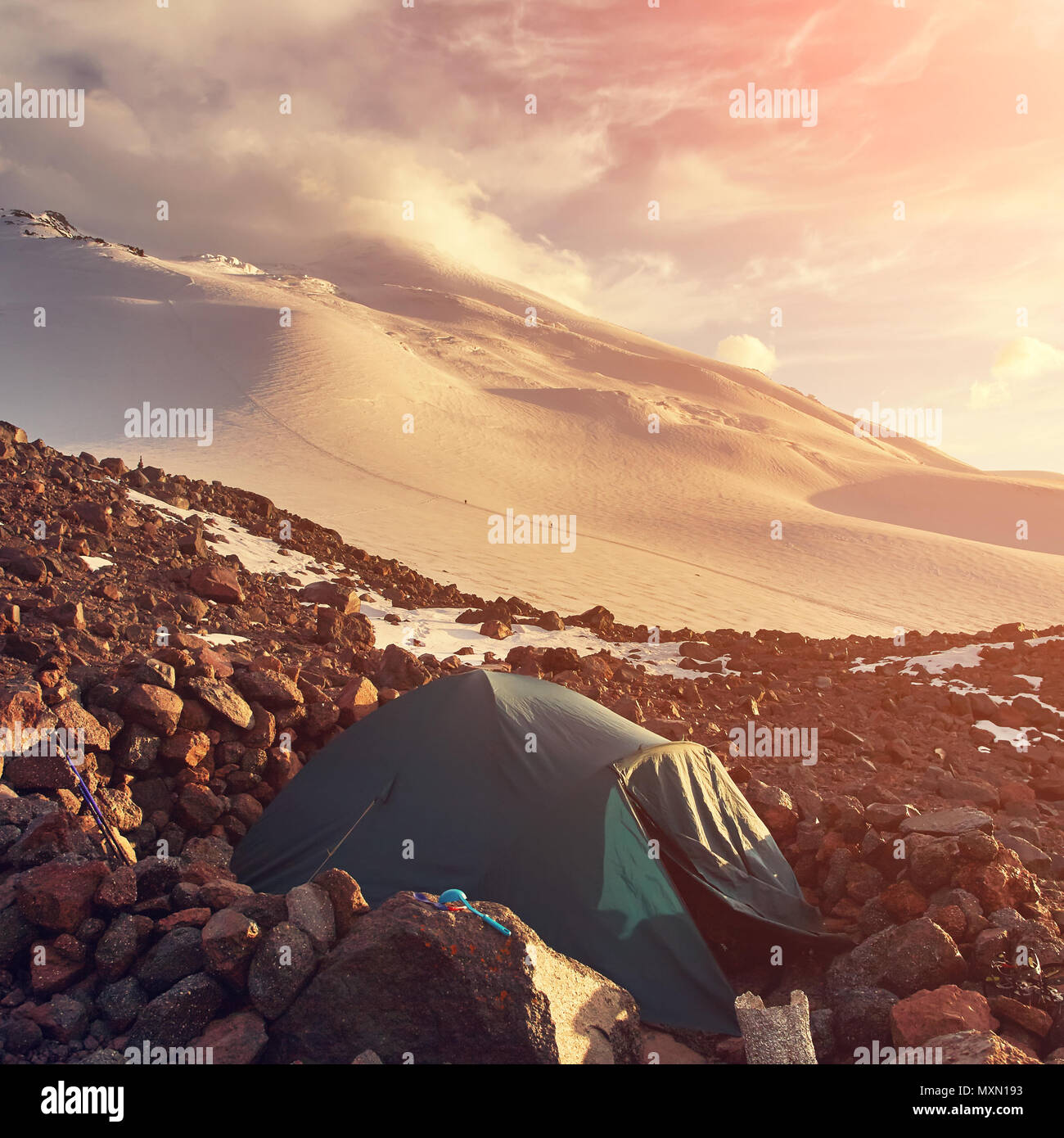 tent in the mountains. alpine camp. climbing and hiking Stock Photo - Alamy