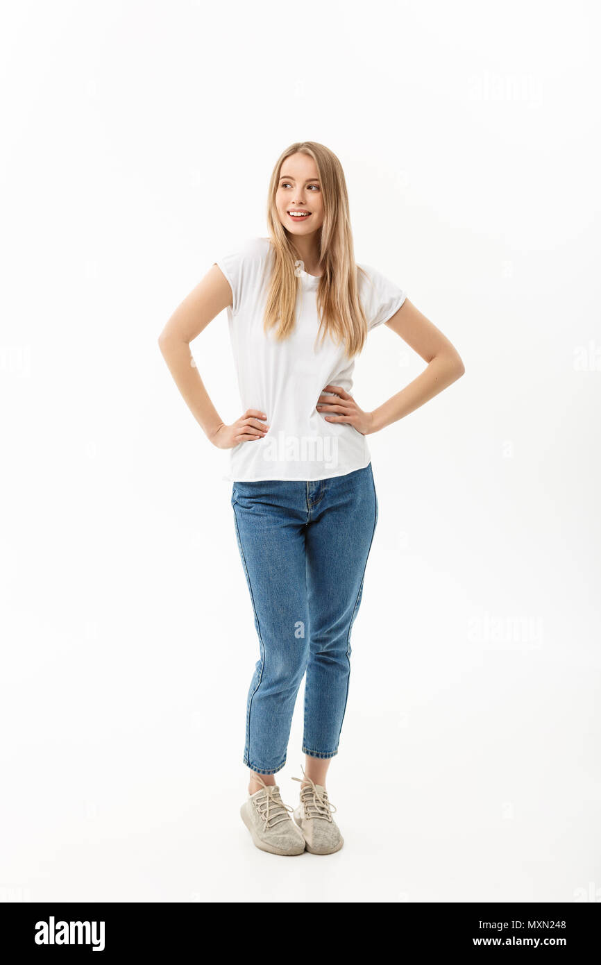 Beautiful standing woman model posing isolated on a white background ...