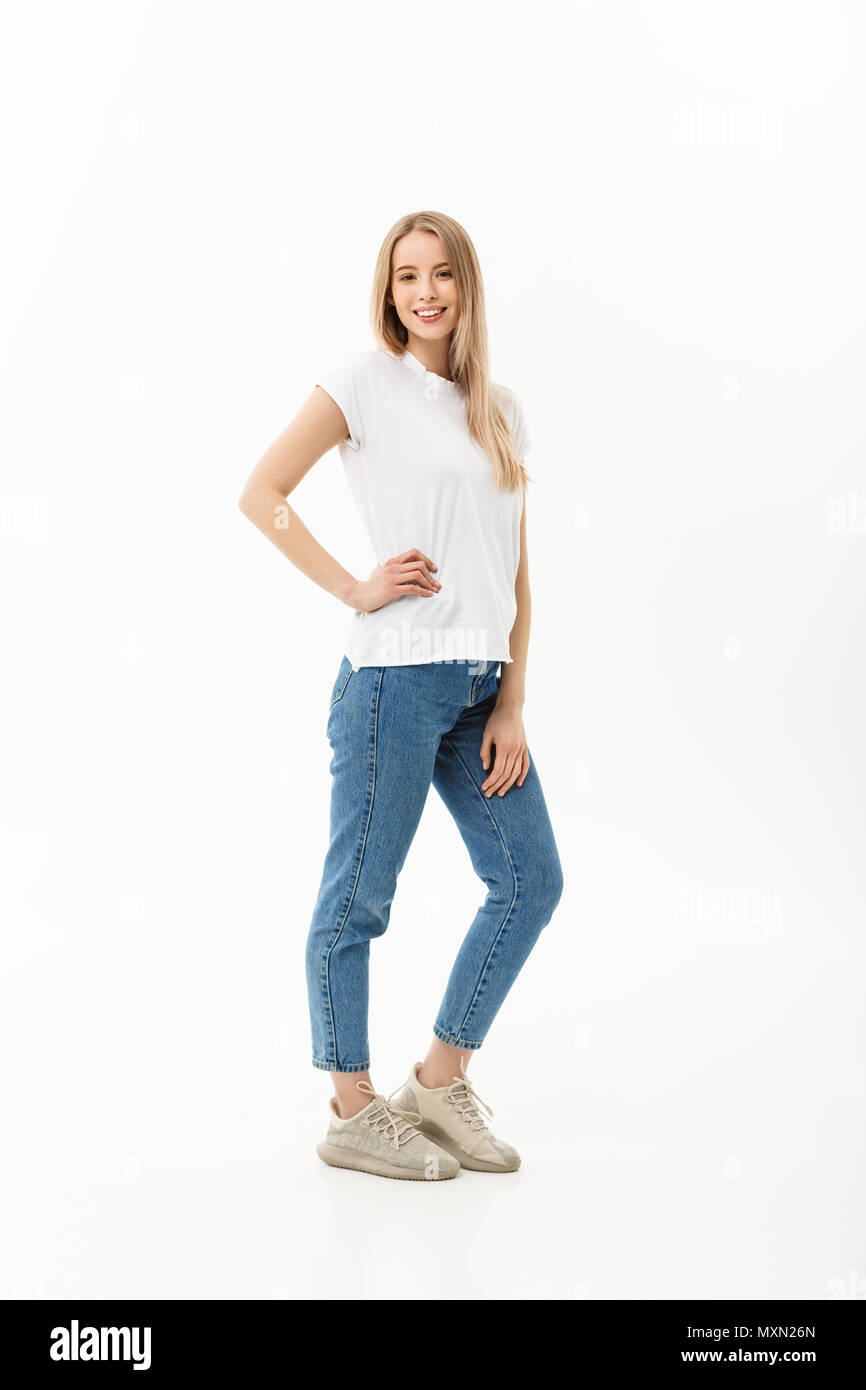 Beautiful standing woman model posing isolated on a white background ...