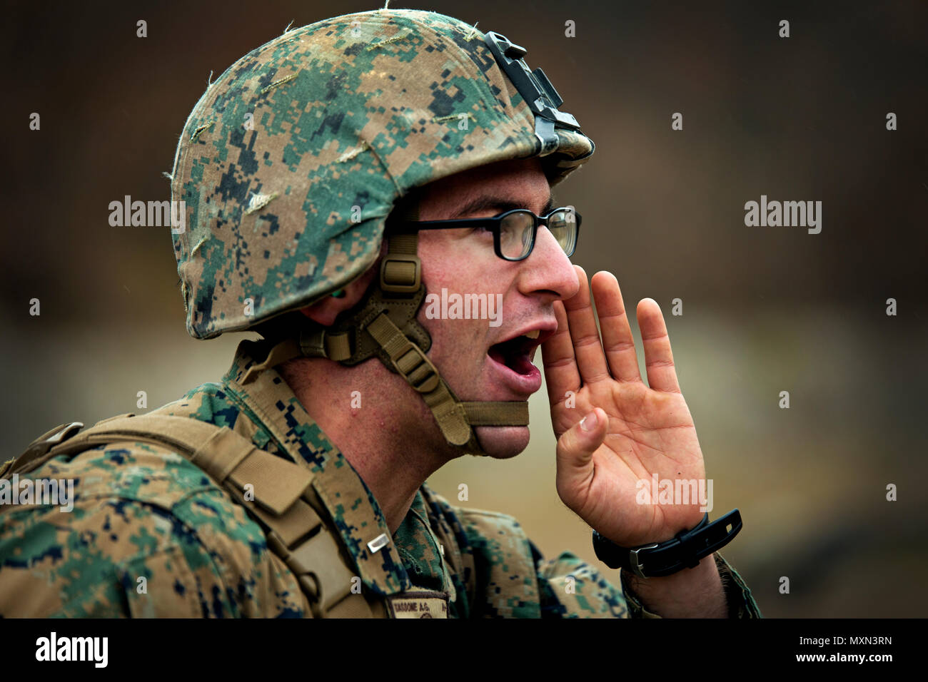 U.S. Marine 1st Lt. Alex Tassone, third platoon commander, issues ...