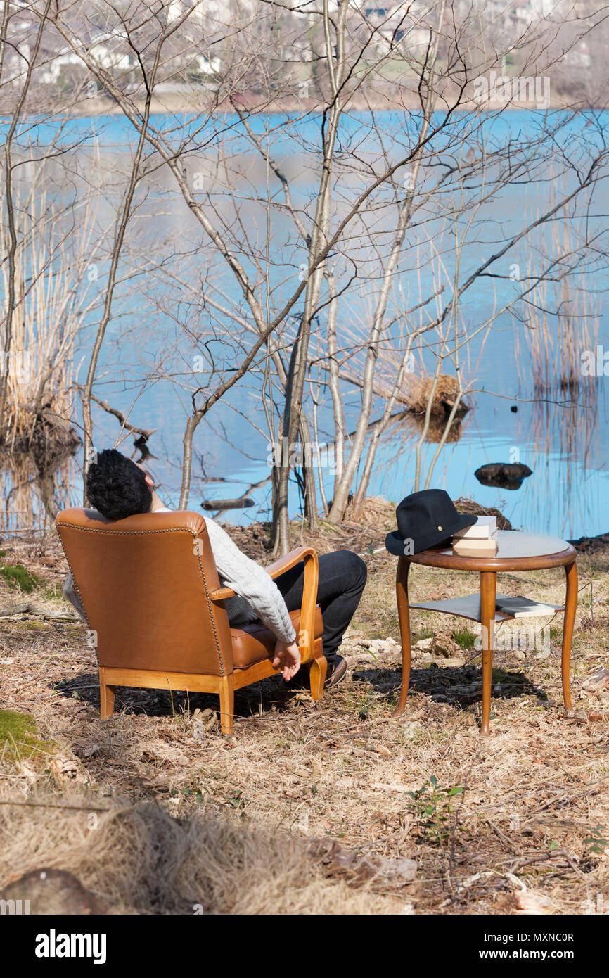 Man sleeping chair and rear view hi-res stock photography and images ...