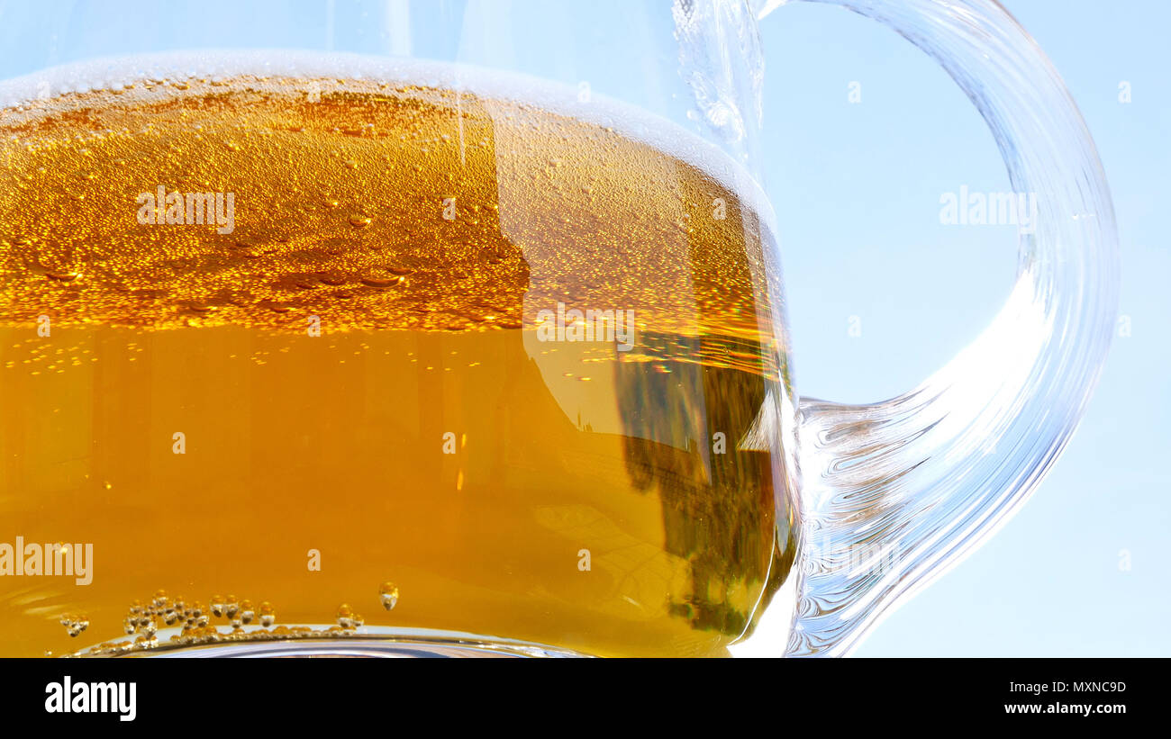Detail of Beer Glass on the Blue Background. Bottom View Stock Photo ...