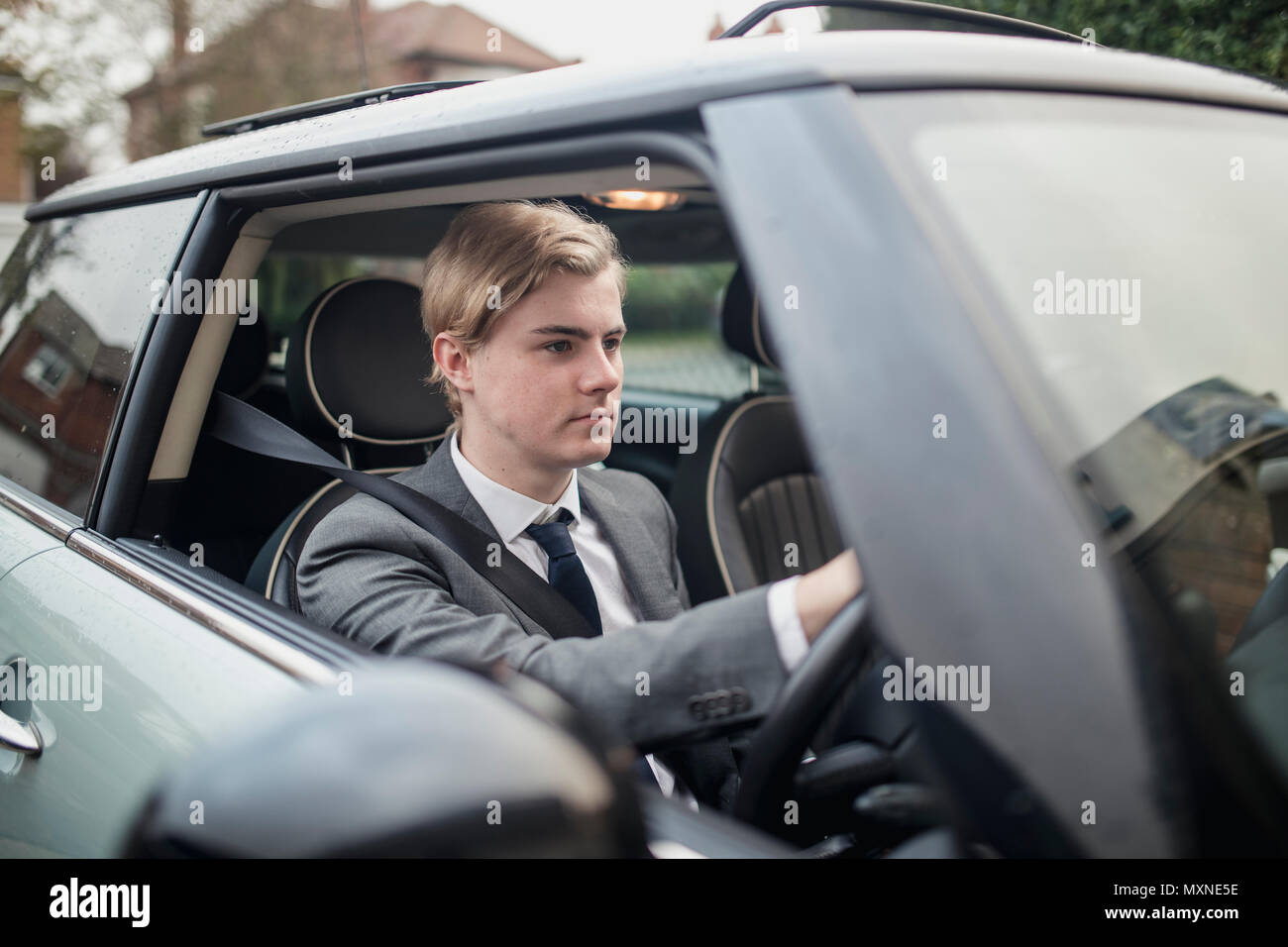 Man driving suit uk hi-res stock photography and images - Alamy