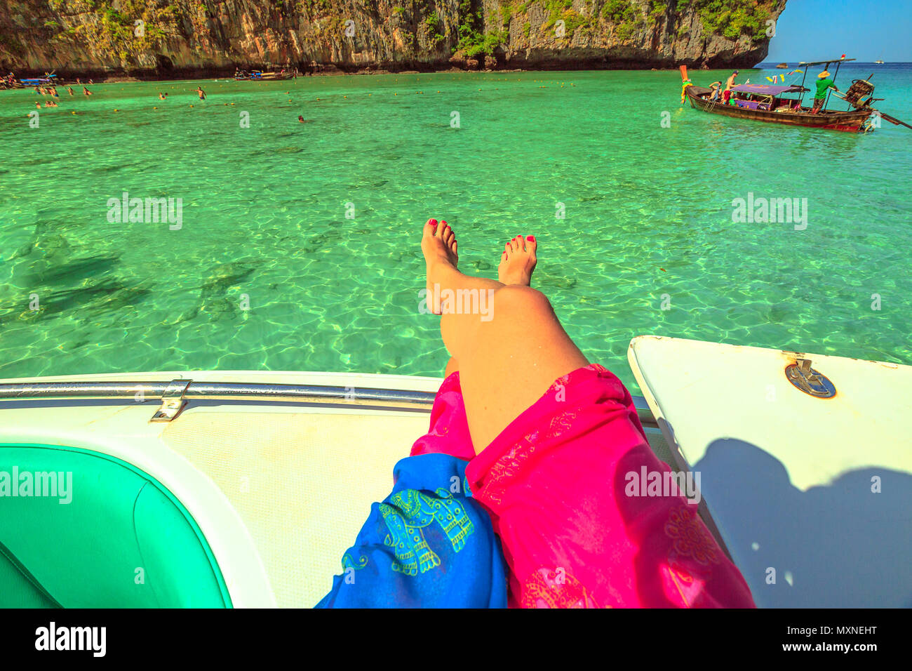 Sunbathing legs on boat in hi-res stock photography and images - Alamy