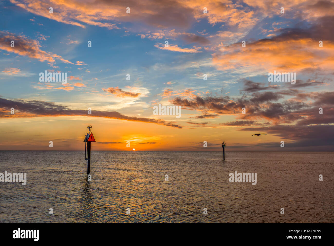 Colorful sunset over the Gulf of Mexico and the Gulf Intracoastal ...