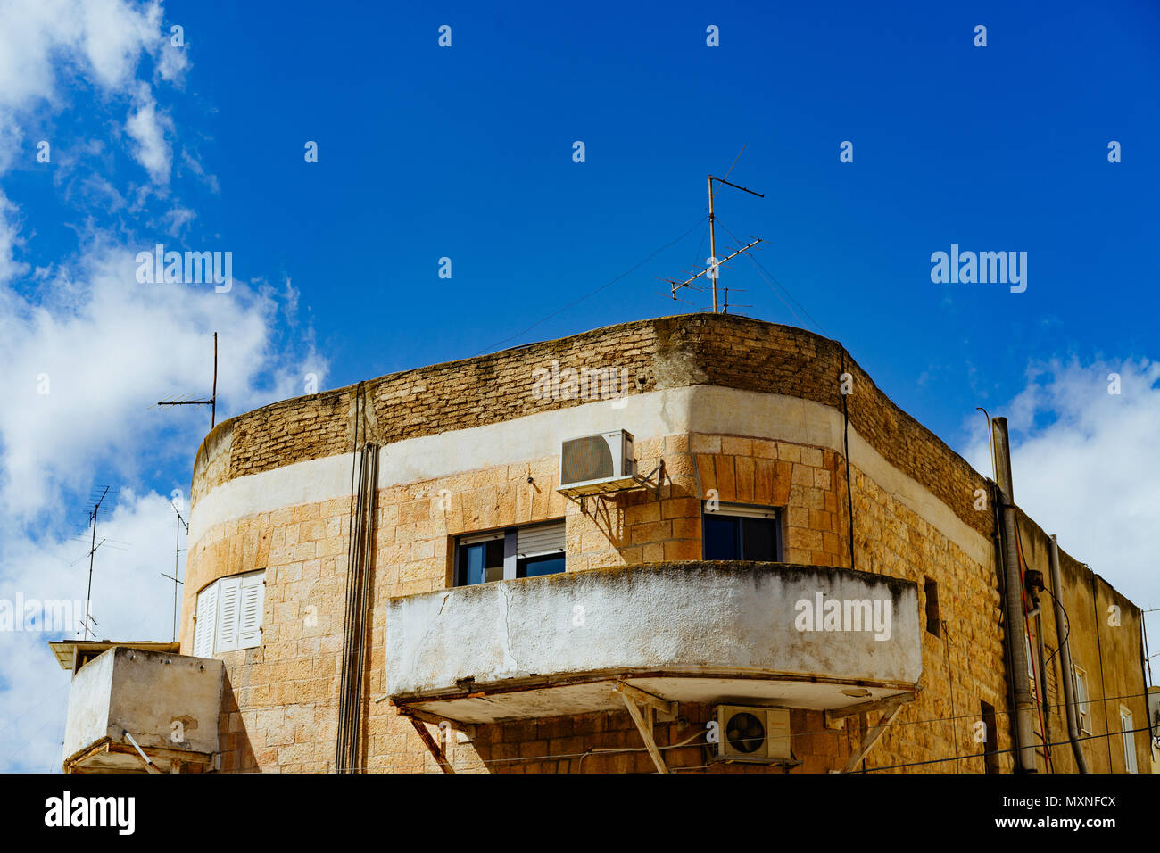 Old yellow brick building in Israel Stock Photo - Alamy