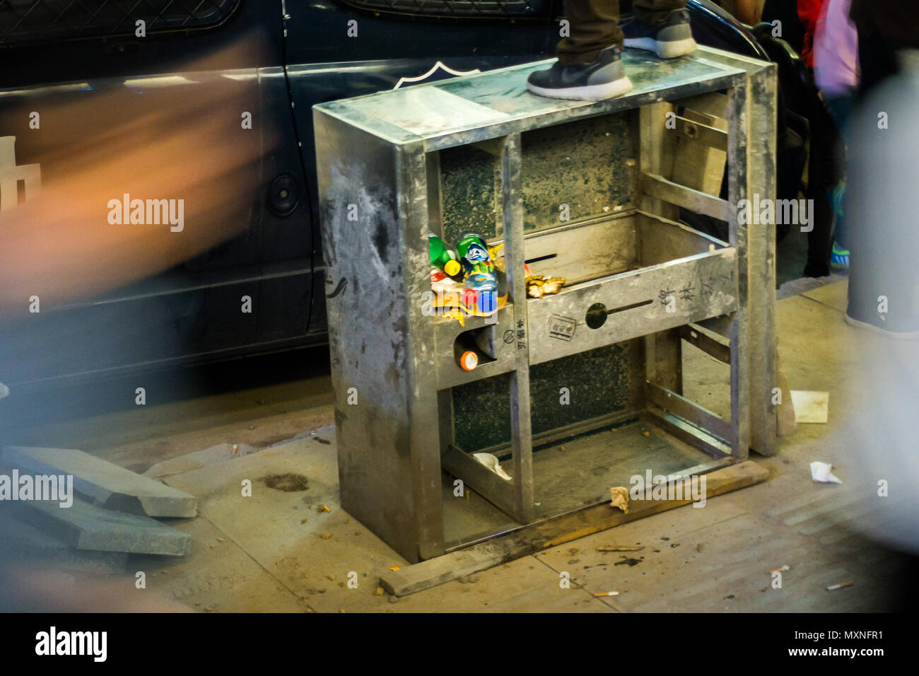 Broken Trash Can and Unplaced Rubbish Stock Photo - Alamy