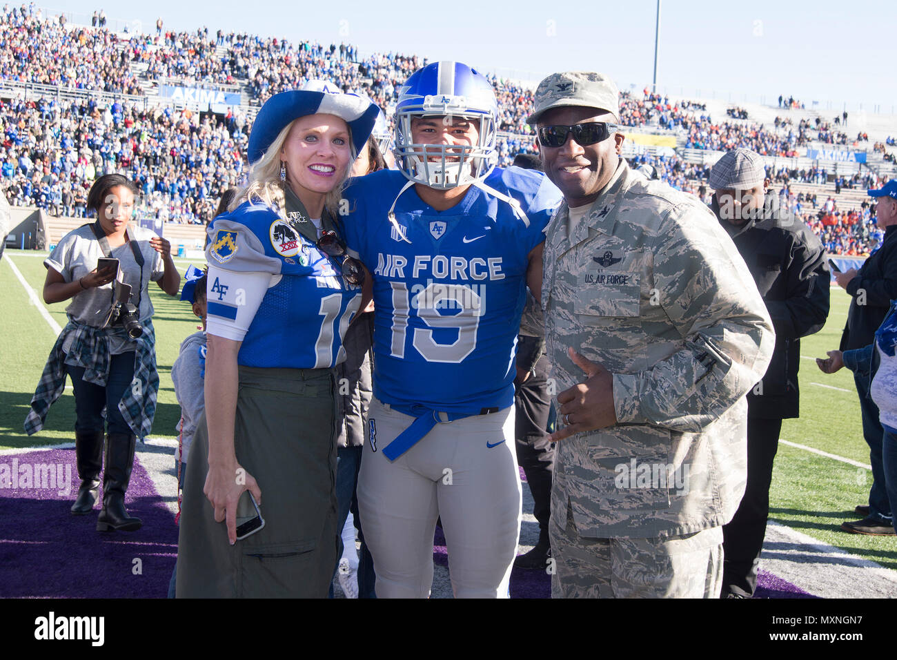 Brayden Hill, a senior, and his family, are honored during pre-game ...
