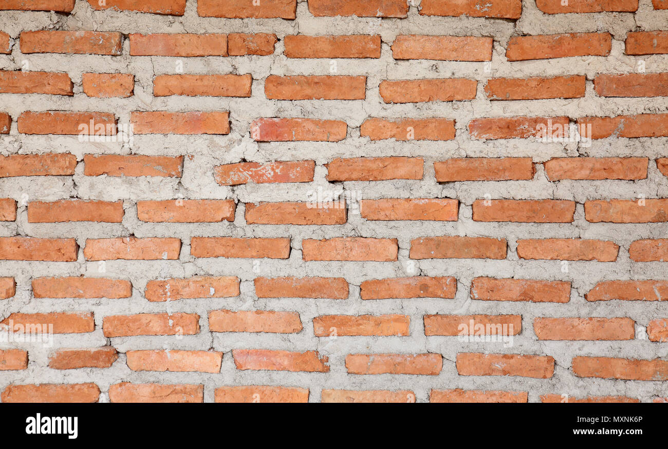 orange concrete block wall background and texture Stock Photo - Alamy