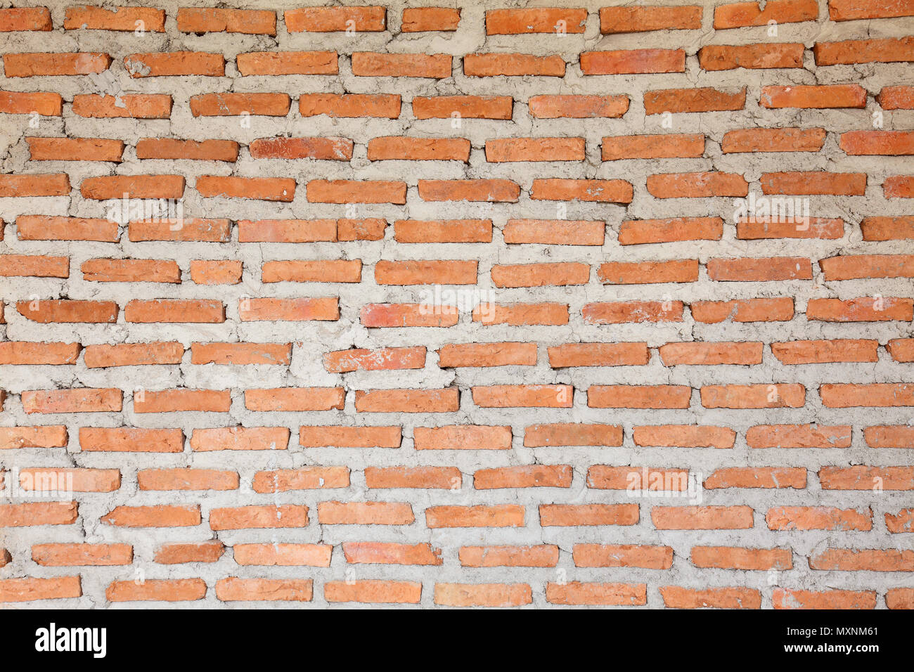 orange concrete block wall background and texture Stock Photo - Alamy