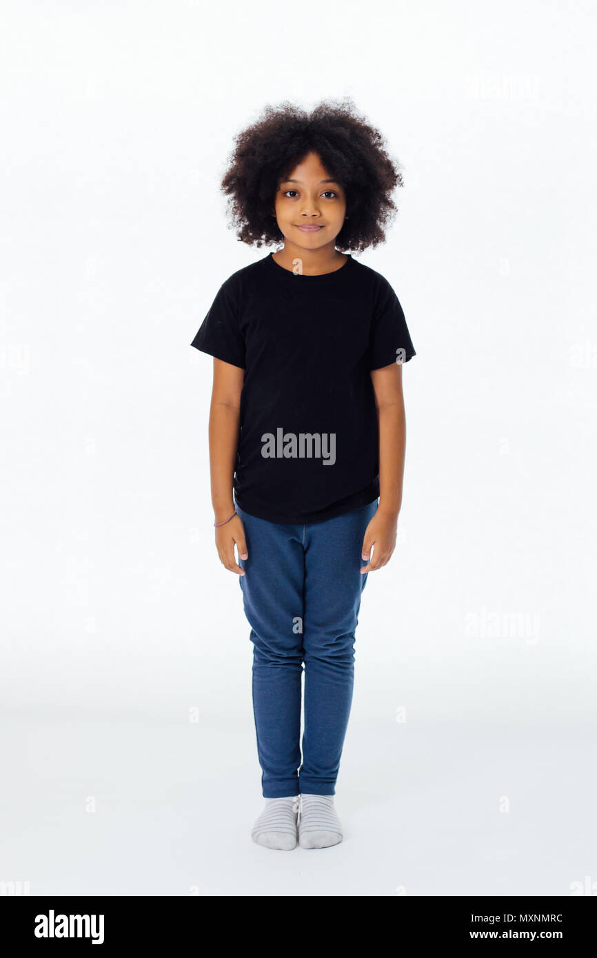 Pre-teen African American kid in casual style standing still isolated ...