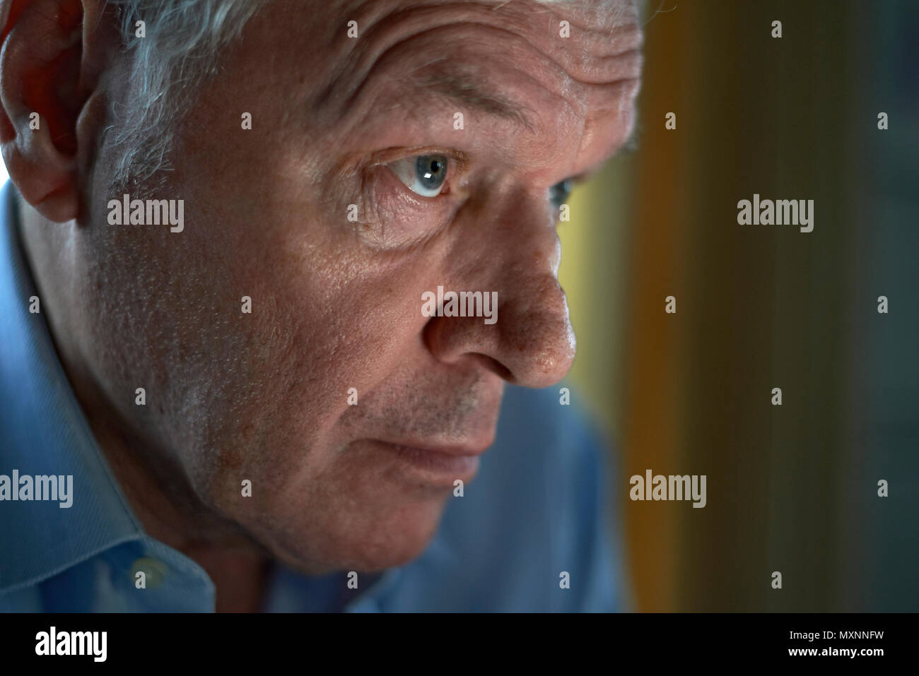 Side portrait old sad man hi-res stock photography and images - Alamy