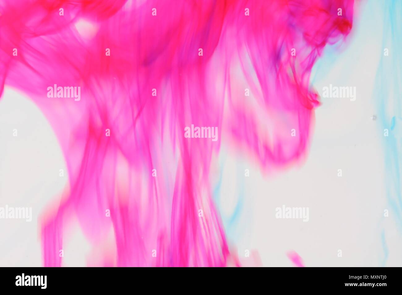 Red ink color in transparent water Stock Photo - Alamy