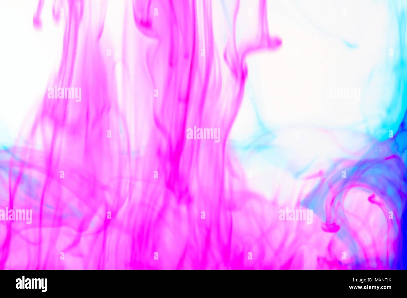 Red ink color in transparent water Stock Photo - Alamy