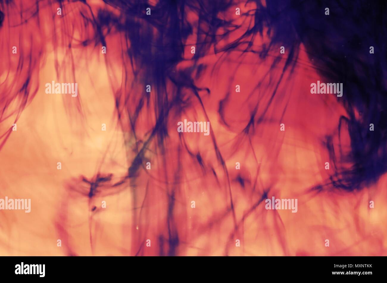 Blue ink color in red water. Useful for texture or background Stock ...