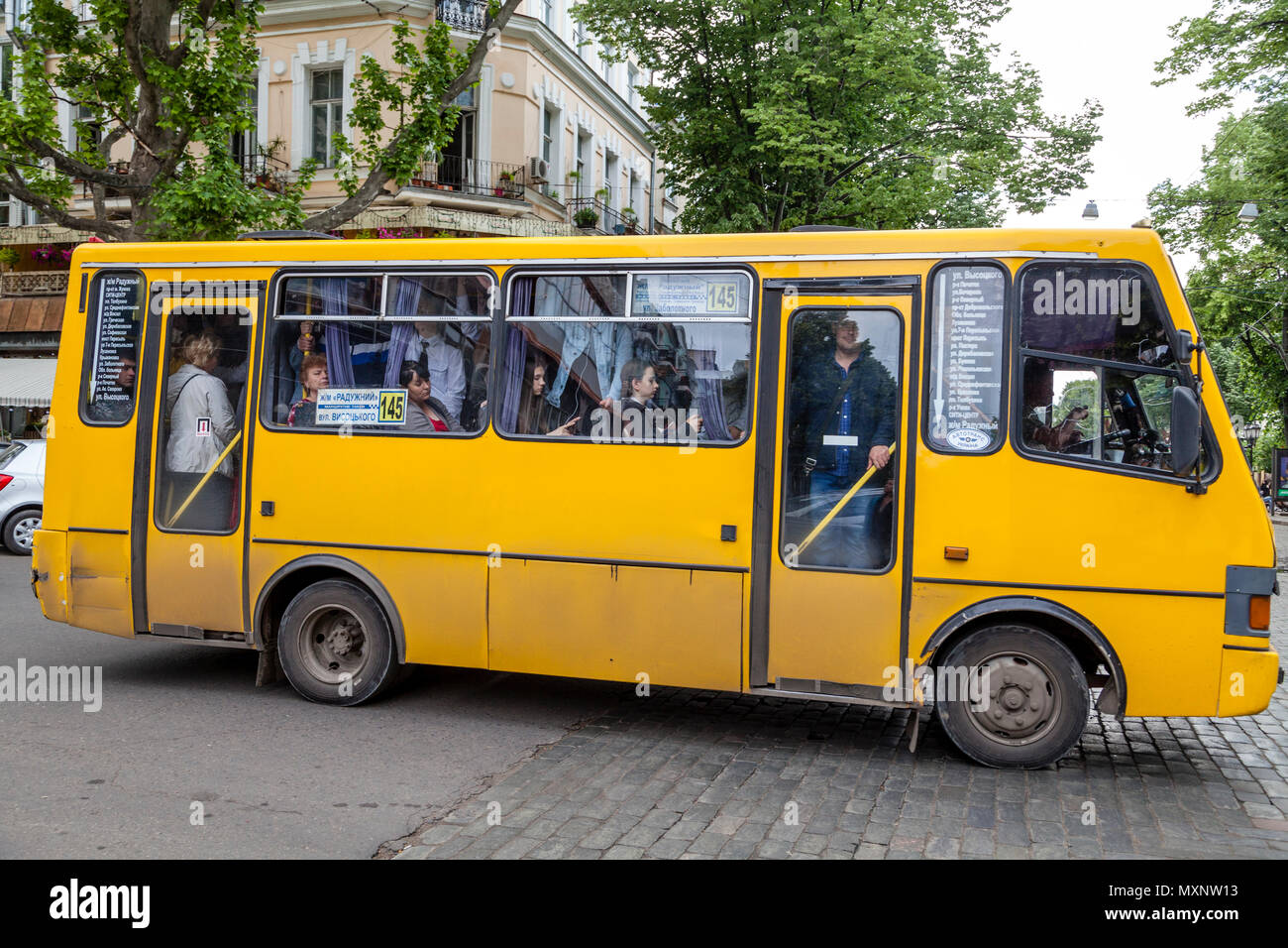 Crowded bus locals in hi-res stock photography and images - Alamy