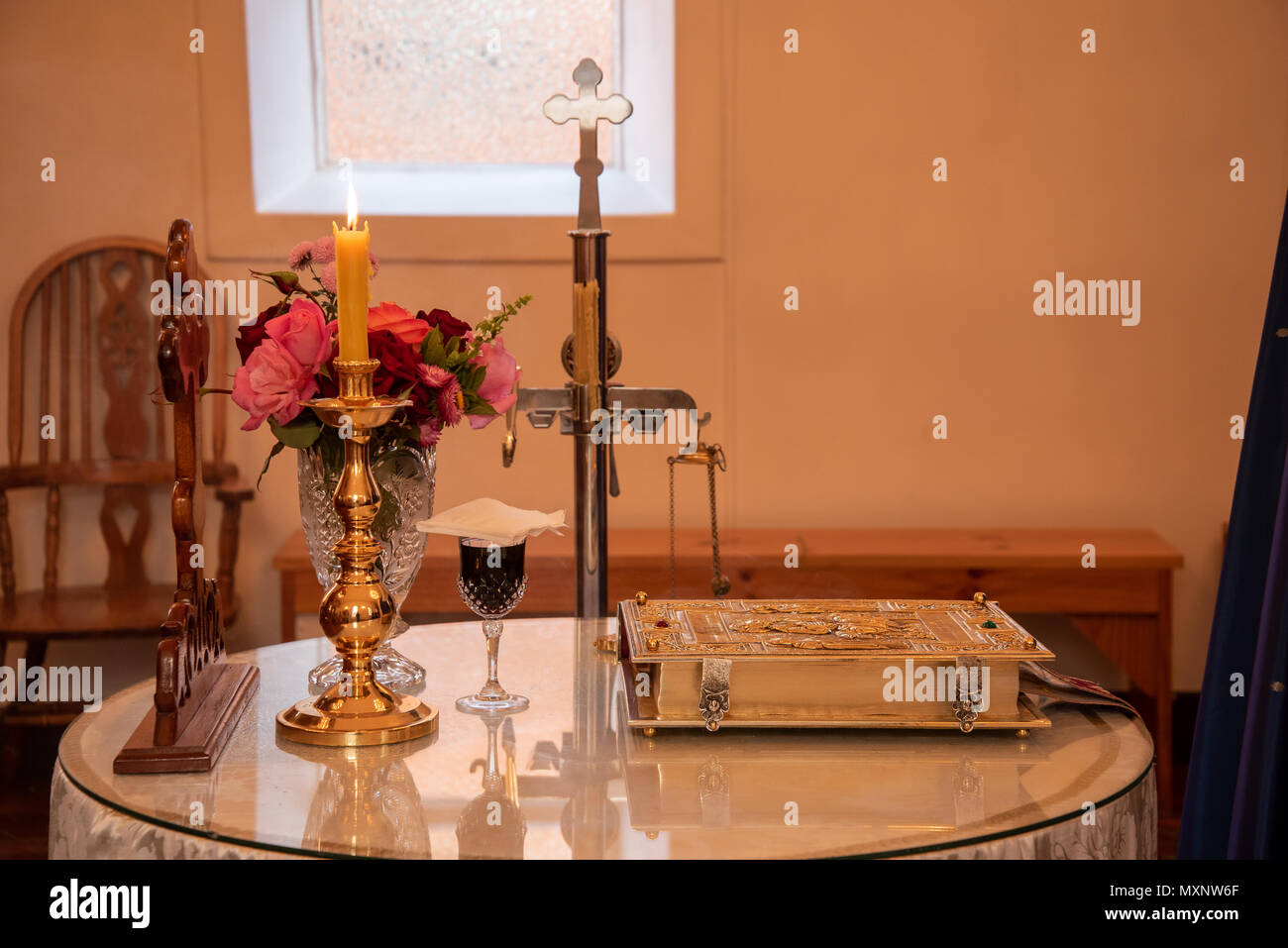 Orthodox objects on a table in a church ready for a wedding ceremony ...