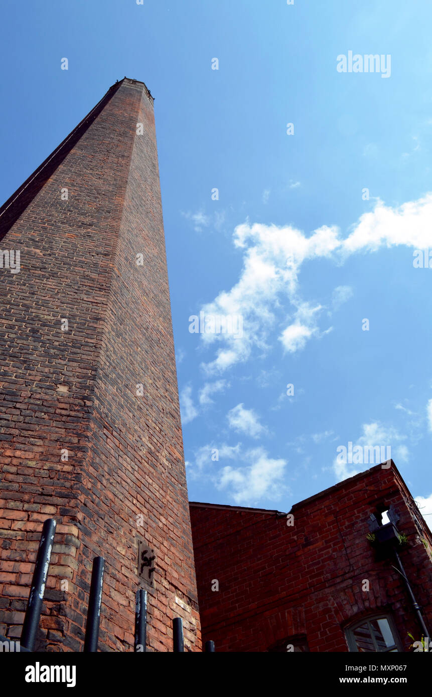 Looking upwards at Dunlop Mill chimney, Hulme Street, Manchester Stock ...