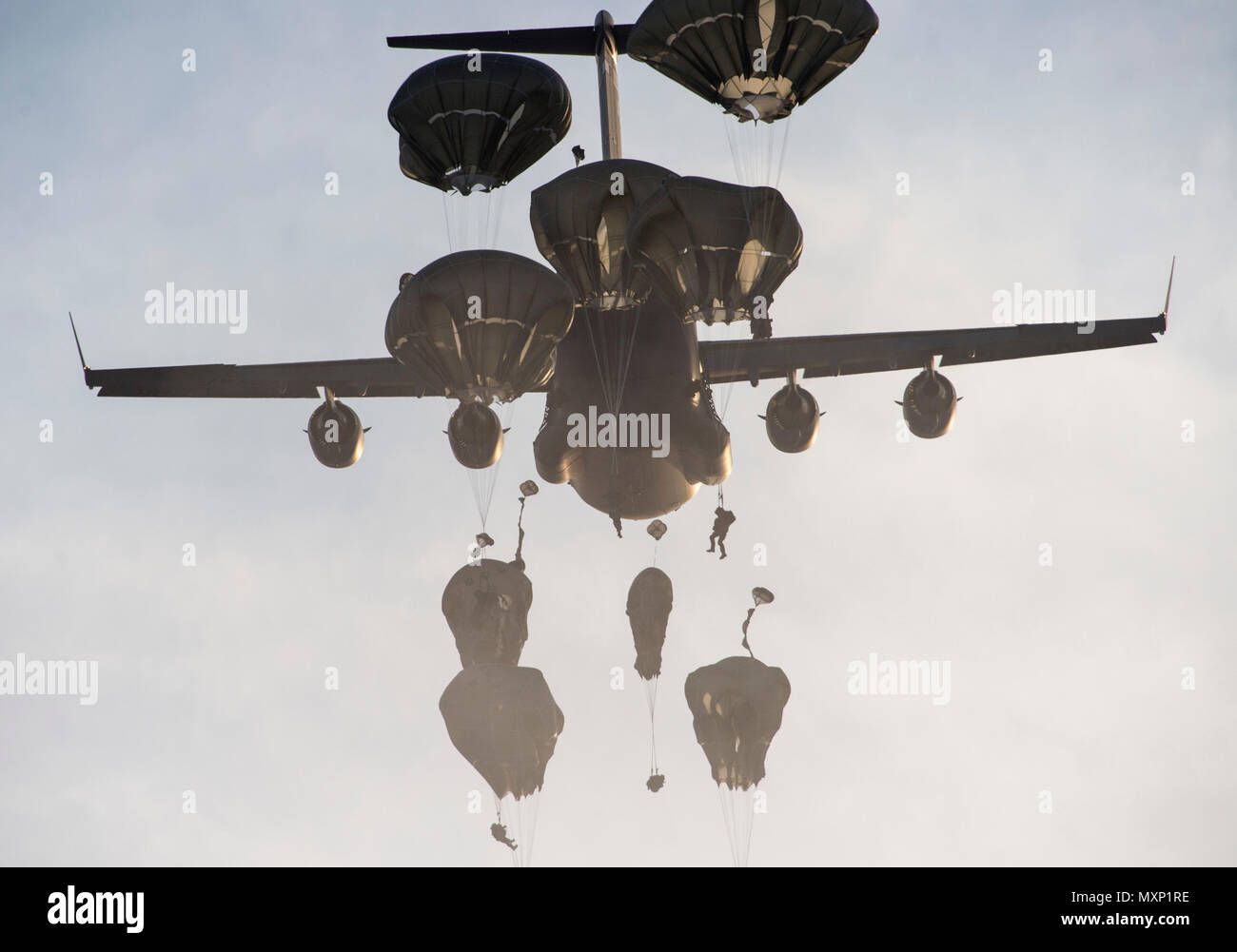 U.S. Army paratroopers, assigned to A Battery, 2nd Battalion, 377th Parachute Field Artillery ...