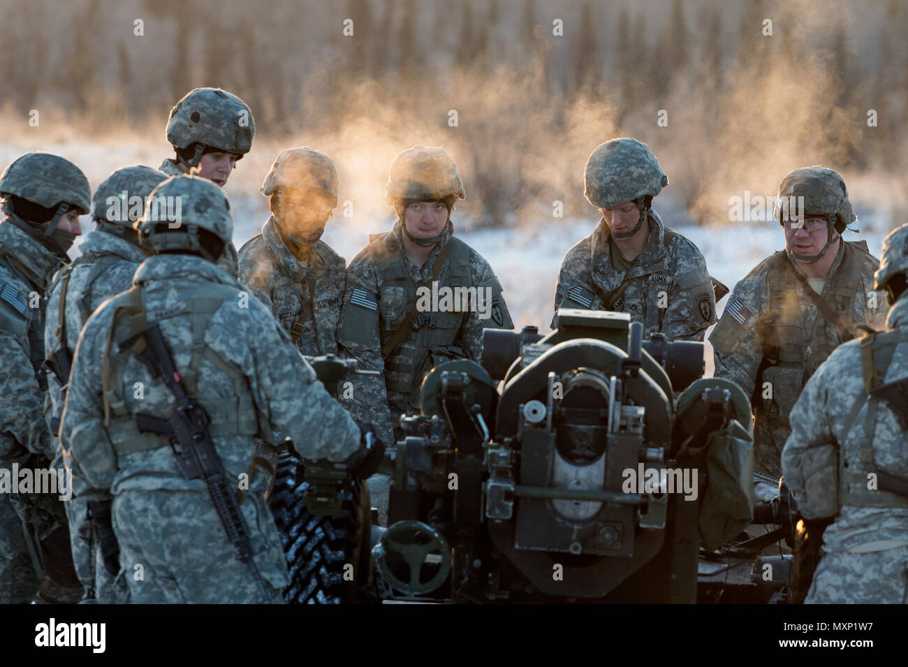 Paratroopers assigned to A Battery, 2nd Battalion, 377th Parachute Field Artillery Regiment, 4th ...