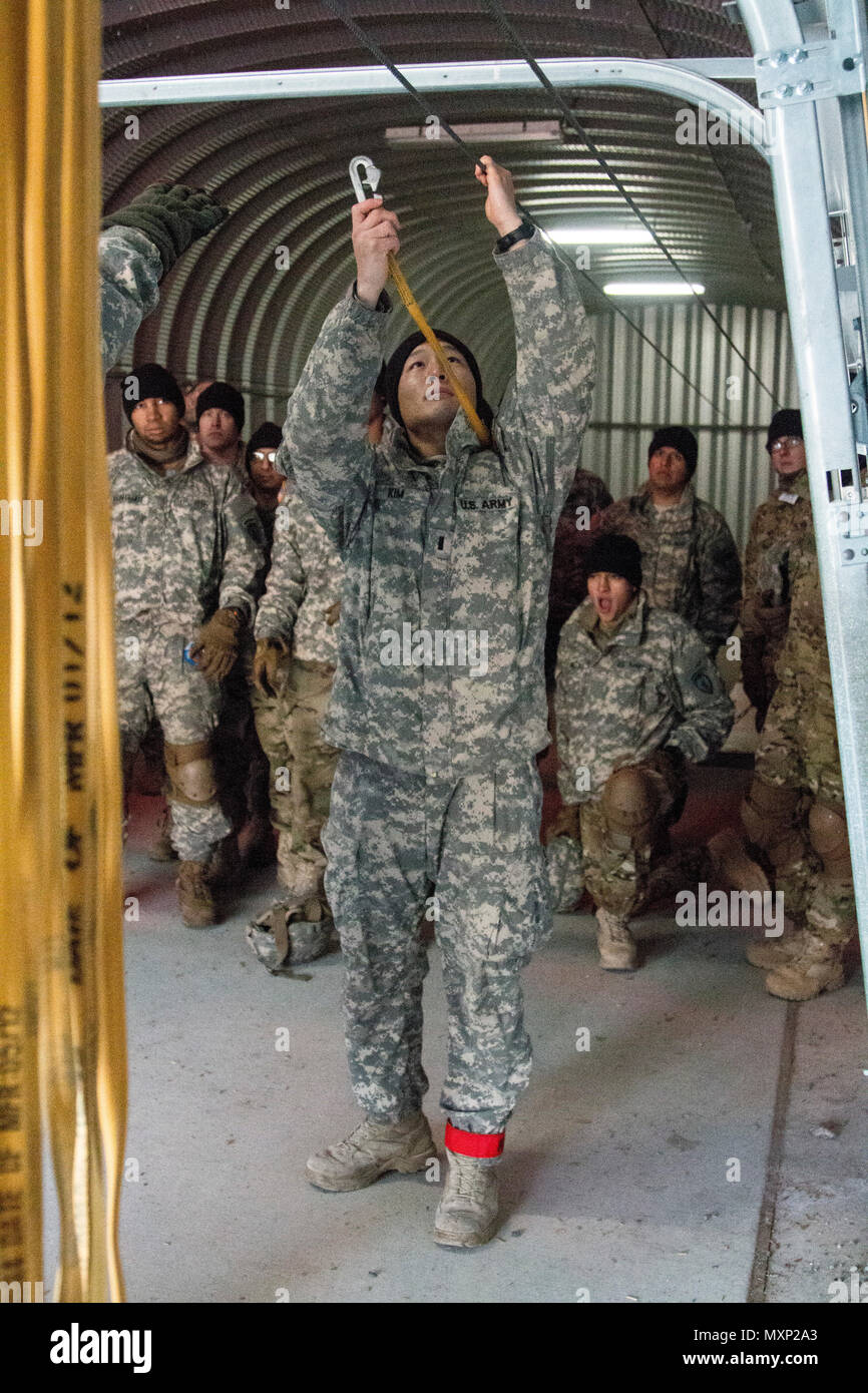 A jump master with 4th Infantry Brigade Combat Team (Airborne), 25th ...