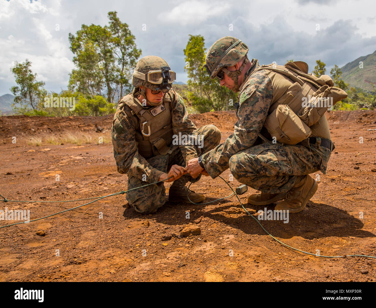 U.S. Marine Cpl. Ryan O’Toole, a combat engineer, and 1st Lt. Daniel ...