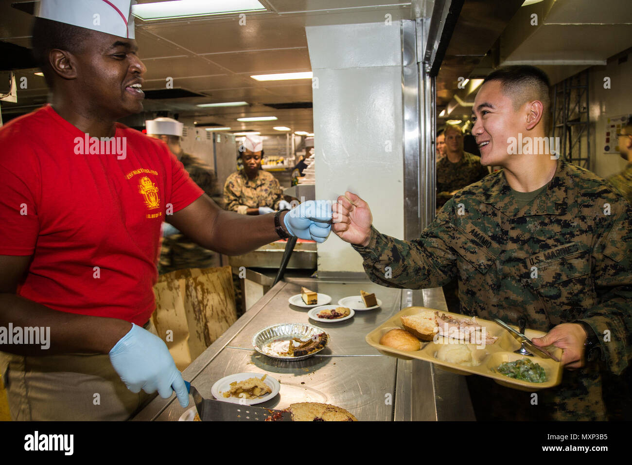 Thanksgiving day dinner held hi-res stock photography and images - Alamy