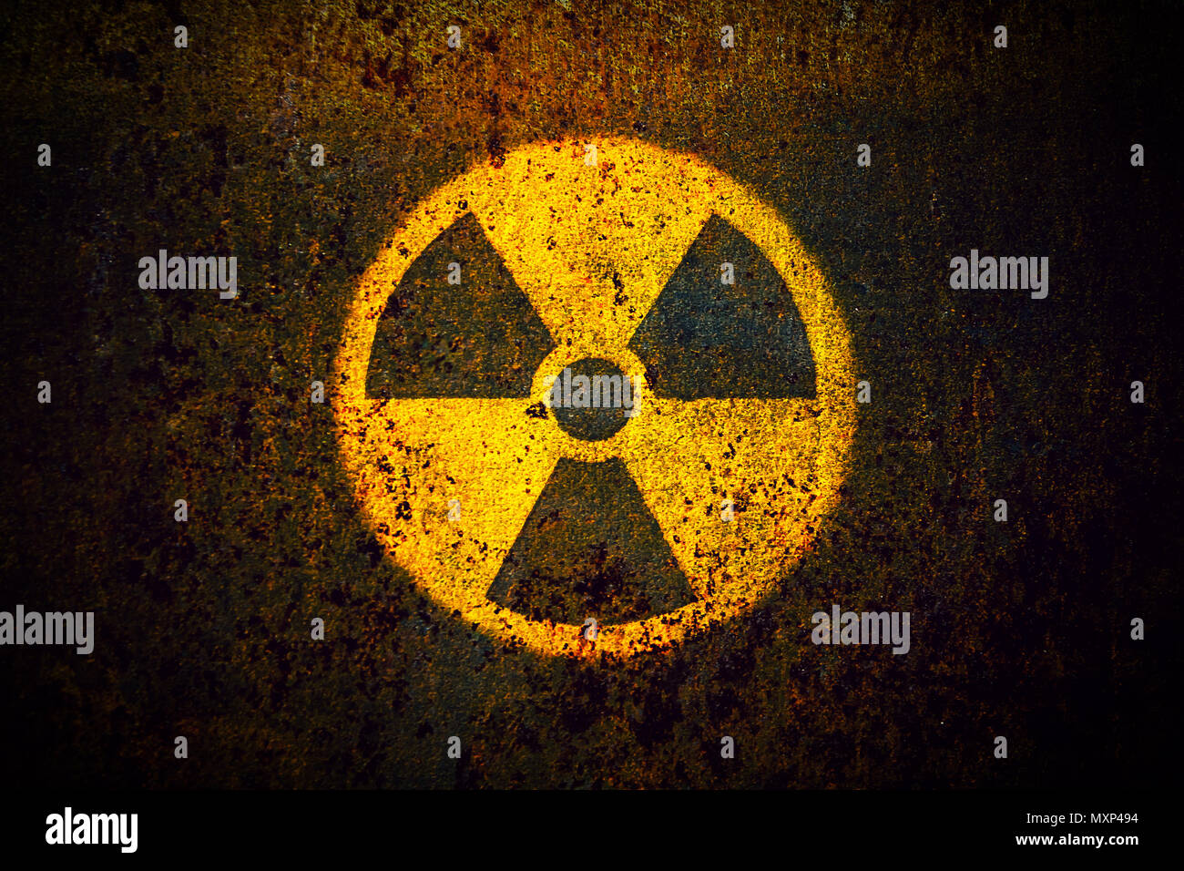 Round yellow radioactive (ionizing radiation) danger symbol painted on ...