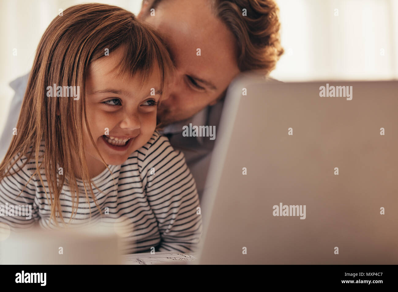 Father daughter working on laptop hi-res stock photography and images ...