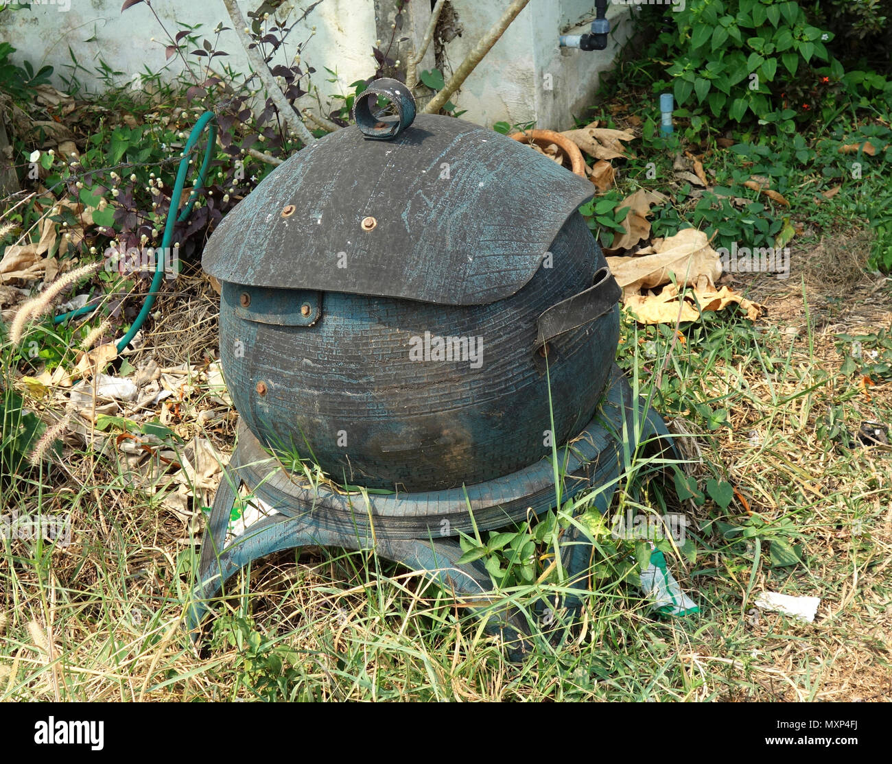 Dustbin on side hi-res stock photography and images - Alamy