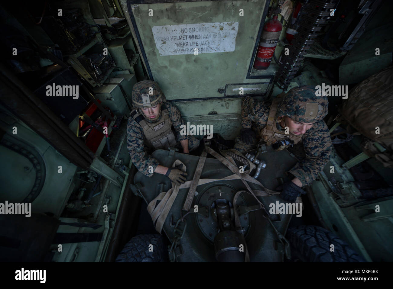 Marines with Battery B, 1st Battalion, 11th Marine Regiment, secure an ...