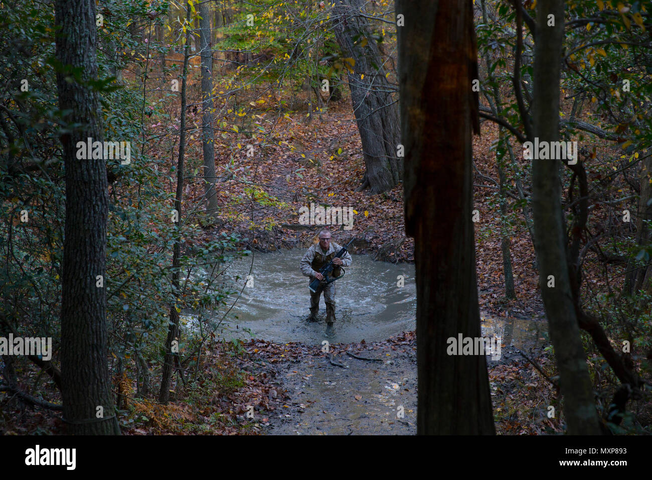 A U.S. Marine candidate with Officer Candidate School (OCS) runs ...