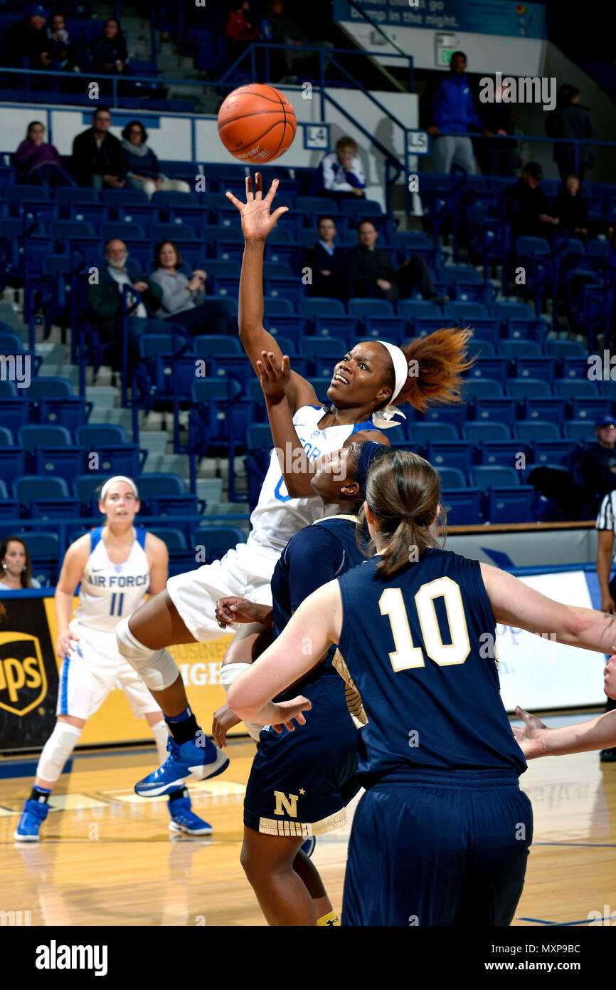 Dee Bennett, a junior, drives in for a layup as Air Force hosted Navy ...