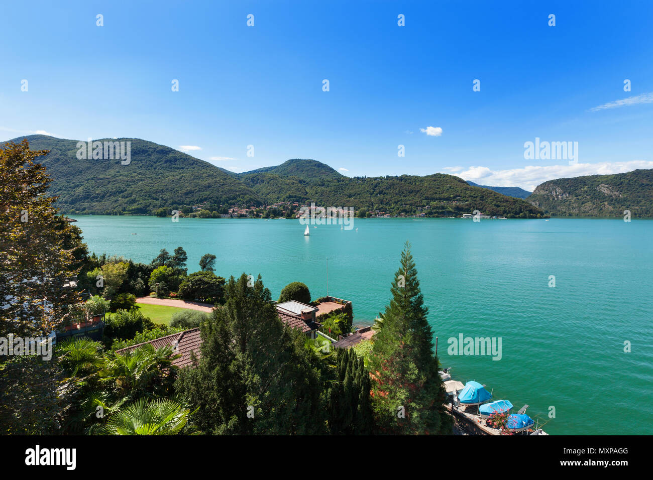 panoramic view of Lugano lake in a summer day Stock Photo - Alamy