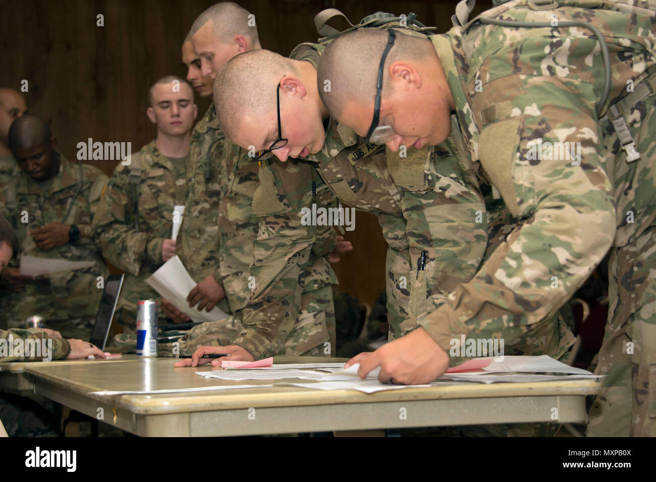 Soldiers in Training with 1st Battalion, 34th Infantry Regiment sign ...