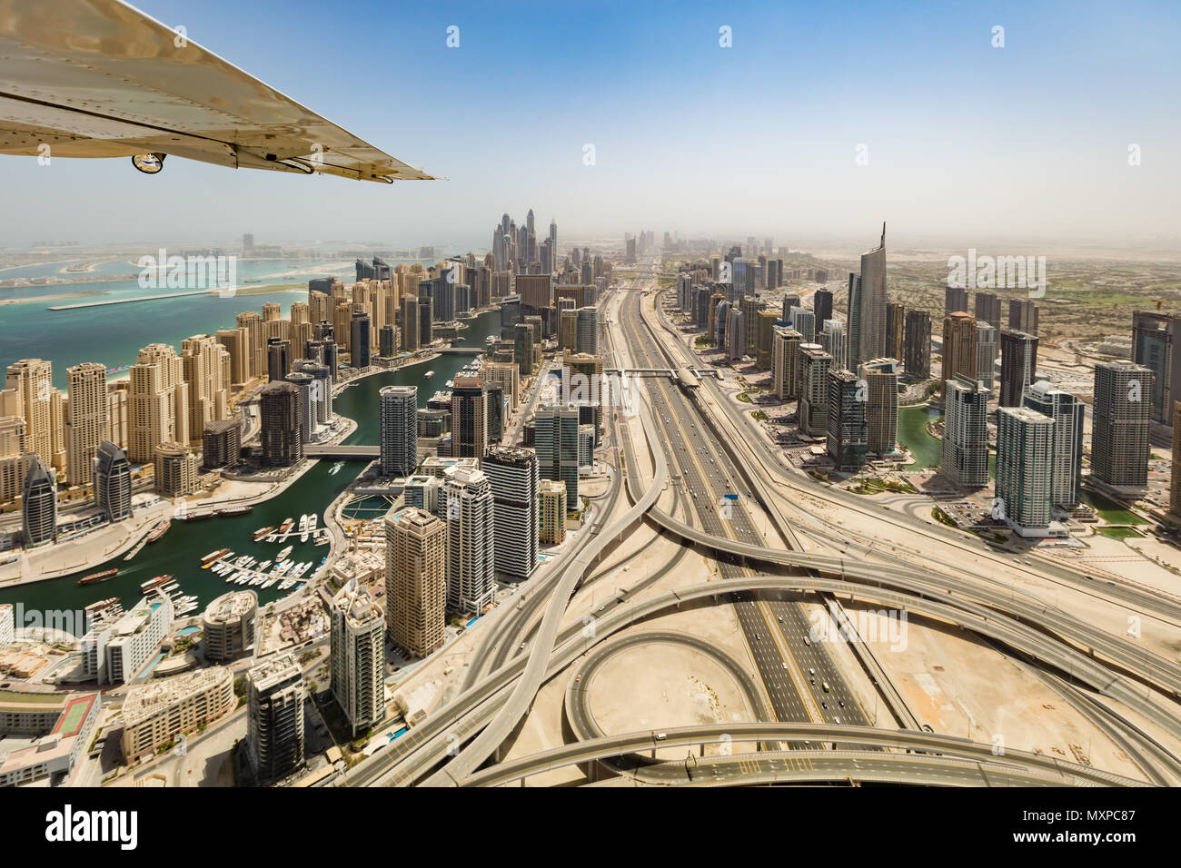 Aerial view of Dubai Marina downtown, panoramic view from airplane ...