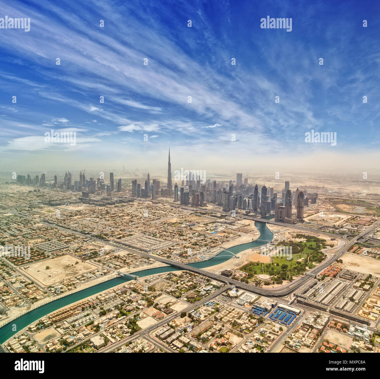 Aerial view of Dubai downtown, panoramic view from airplane window ...