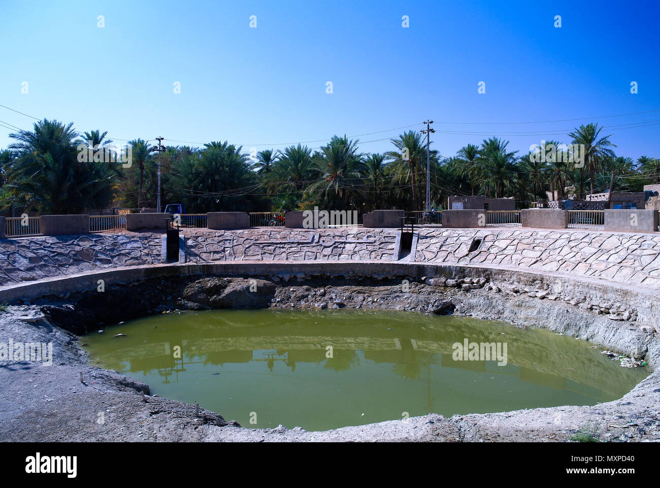 Pond in the center of Shithathah town at Al Mardh oasis near Karbala ...