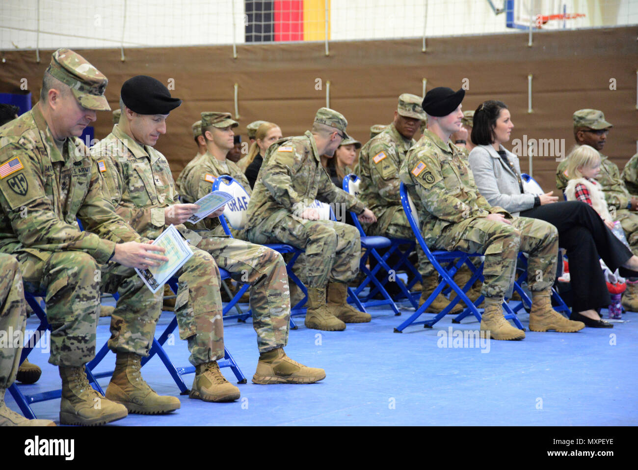 Distinguished guests and family members await the 18th Military Police ...