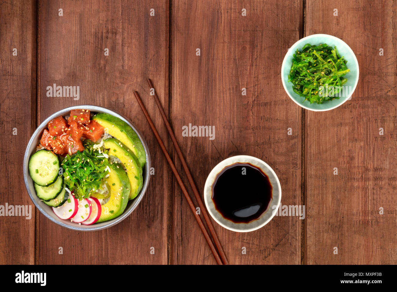 An overhead photo of poke, traditional Hawaiian raw fish salad, with ...