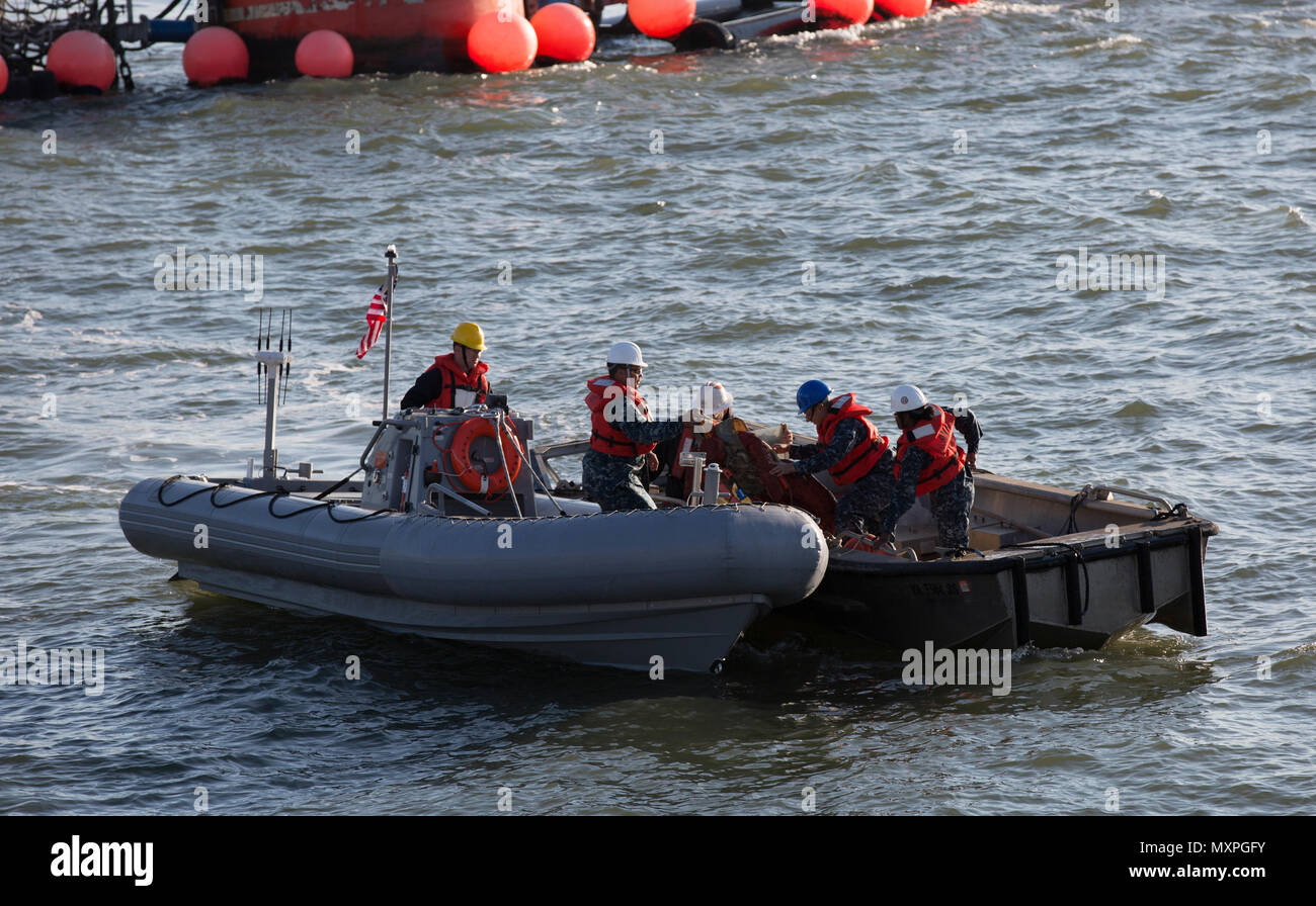 161115-N-IK431-072 NEWPORT NEWS, Va. (Nov. 15, 2016) Sailors recover a ...