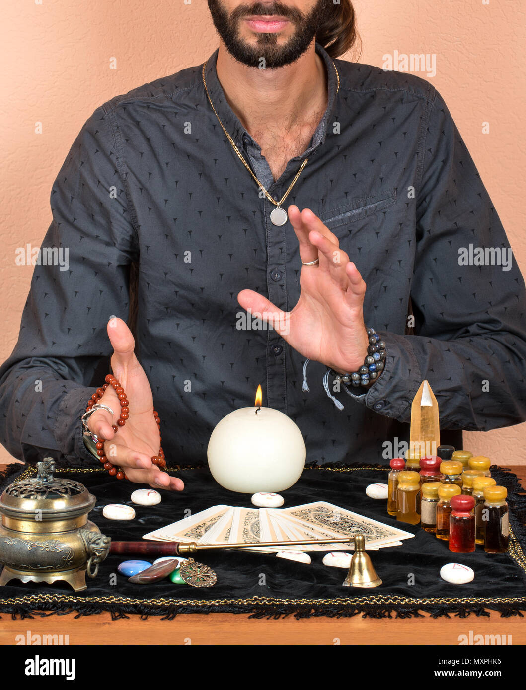 Man magician table hi-res stock photography and images - Alamy