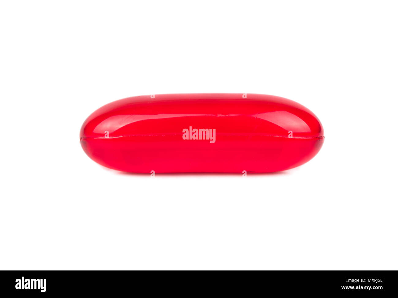 Red pill capsule isolated on white background Stock Photo - Alamy