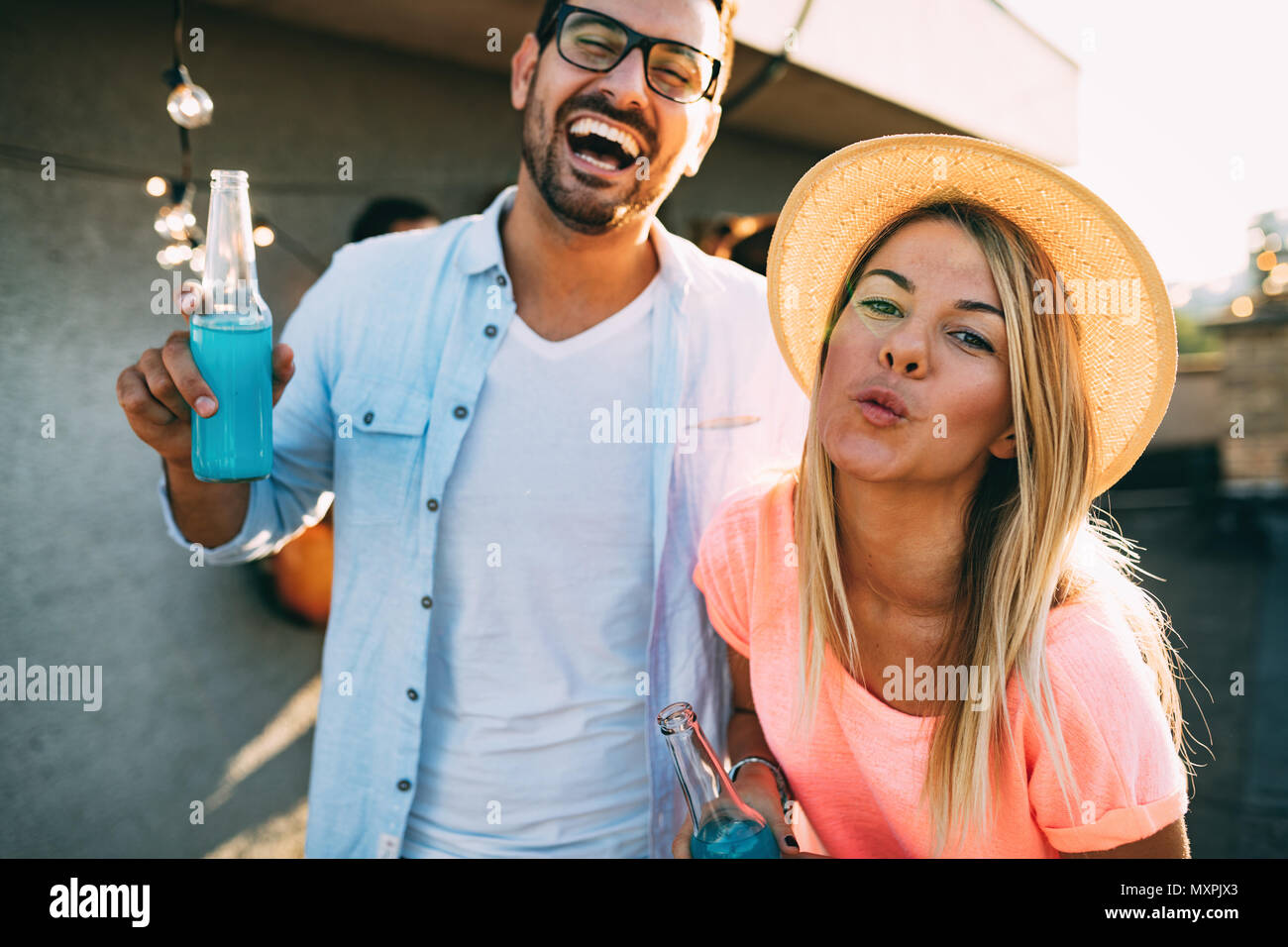 Couple party hi-res stock photography and images - Alamy