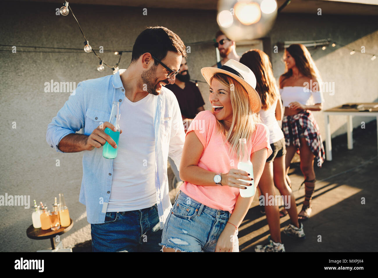 Couple dancing at party hi-res stock photography and images - Alamy